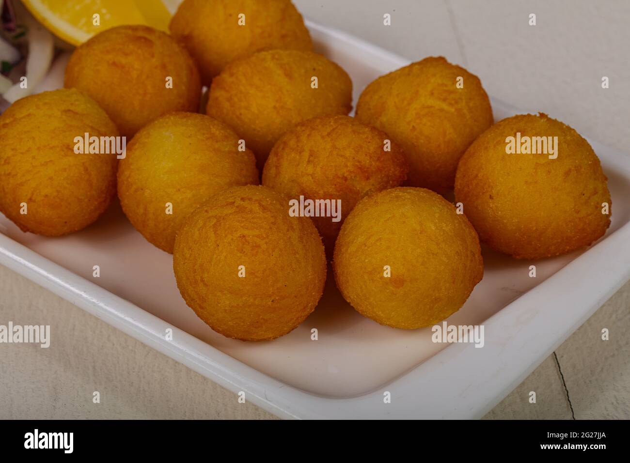 Tasty hot crispy fried potato balls Stock Photo - Alamy