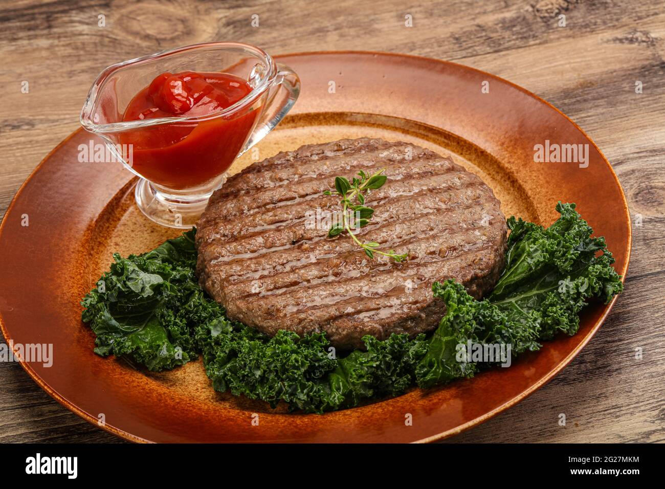 Grilled tasty beef cutlet for burger Stock Photo - Alamy