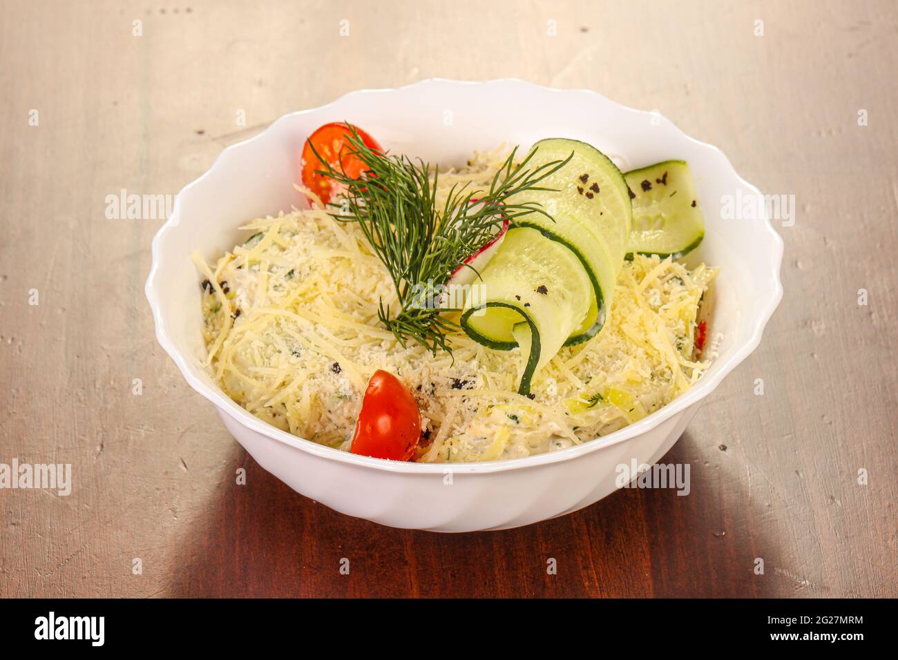 Traditional Russian salad with mayonnaise sauce Stock Photo - Alamy