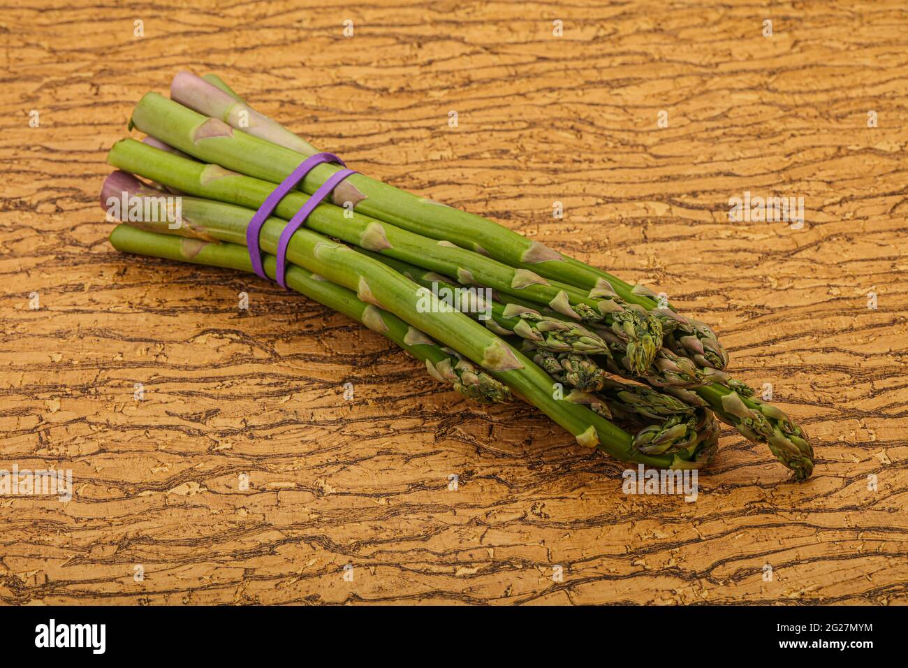 Vegan cuisine - Raw asparagus heap for cooking Stock Photo - Alamy