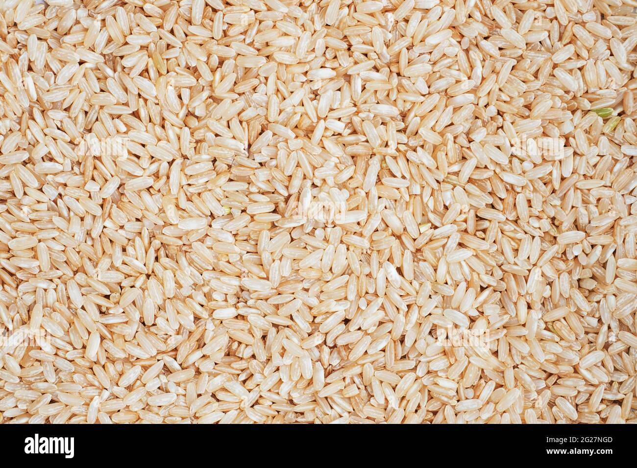 Texture Brown rice raw long grain. background close up Stock Photo - Alamy