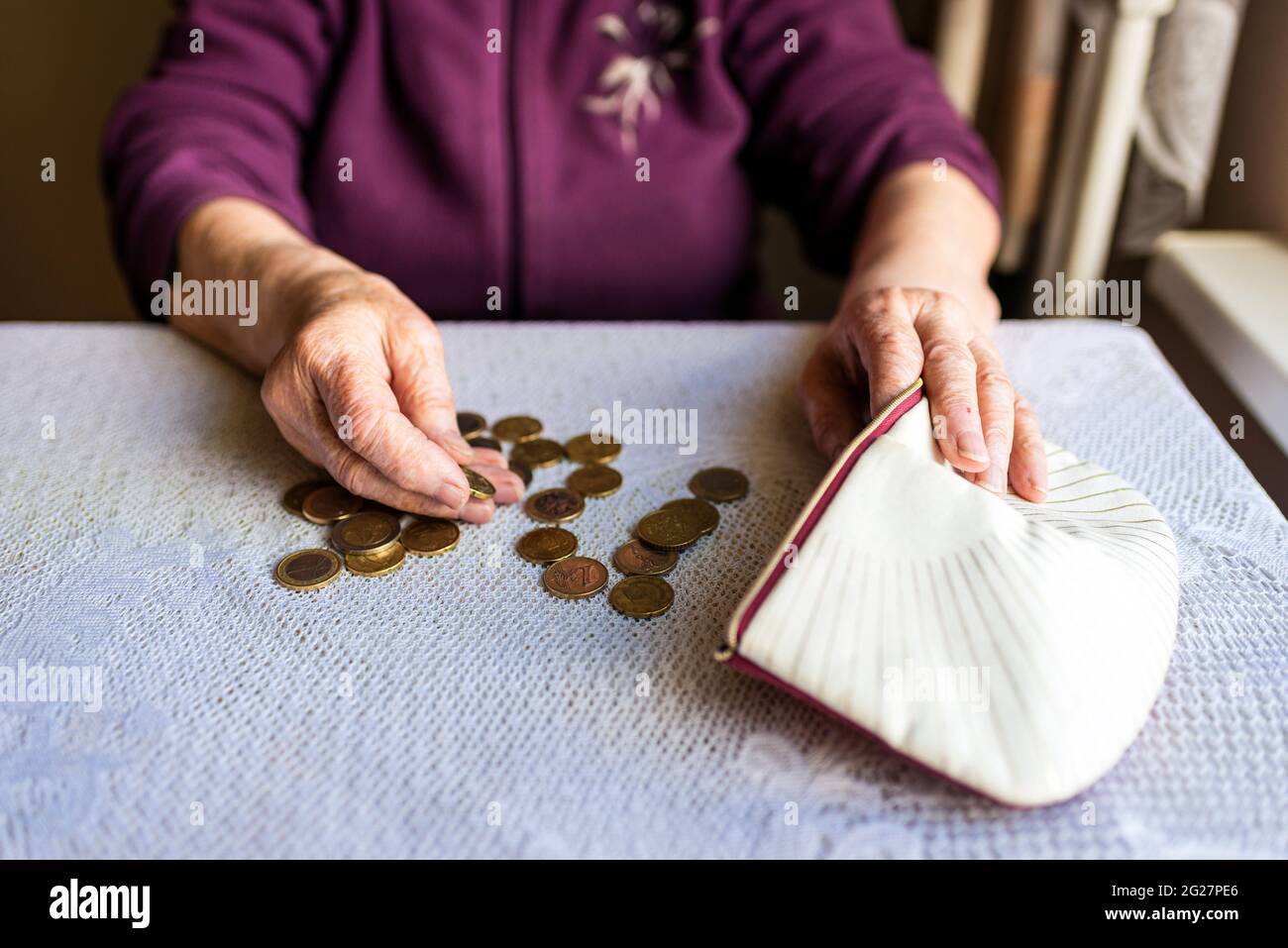Old person counting coins hi-res stock photography and images - Alamy