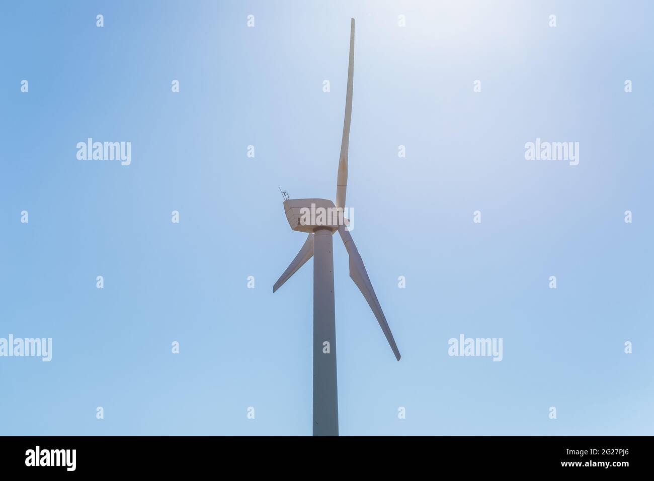 Wind power,one wind turbine and blue sky.wind power concept with copy ...