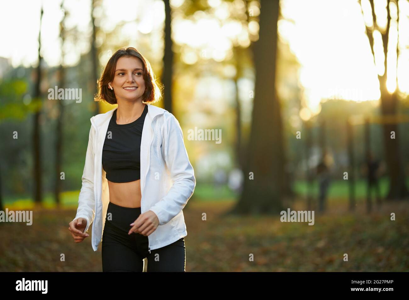 Smiling lady doing physical hi-res stock photography and images - Alamy