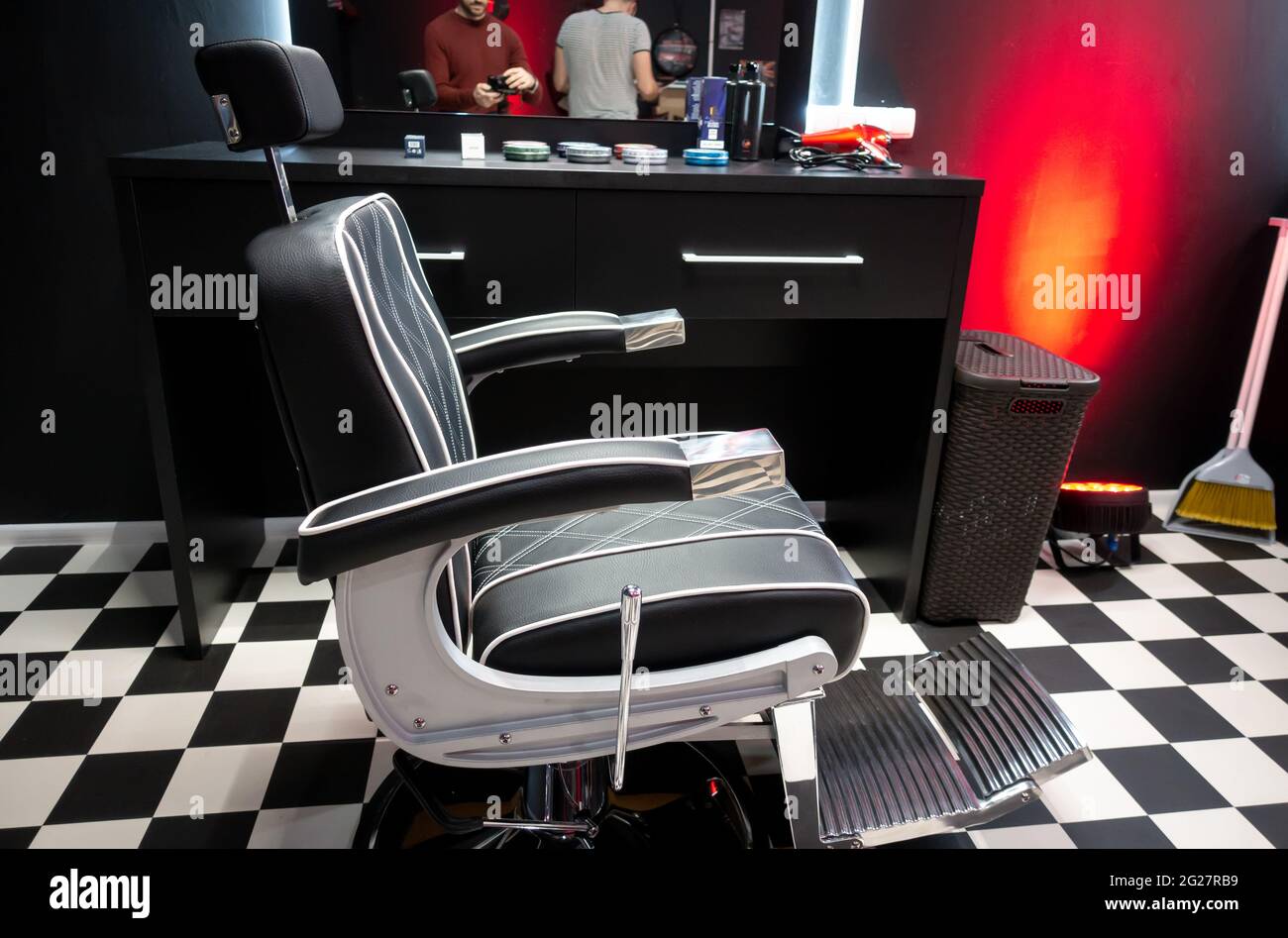 Empty haircut chair in men's hairdresser Stock Photo - Alamy