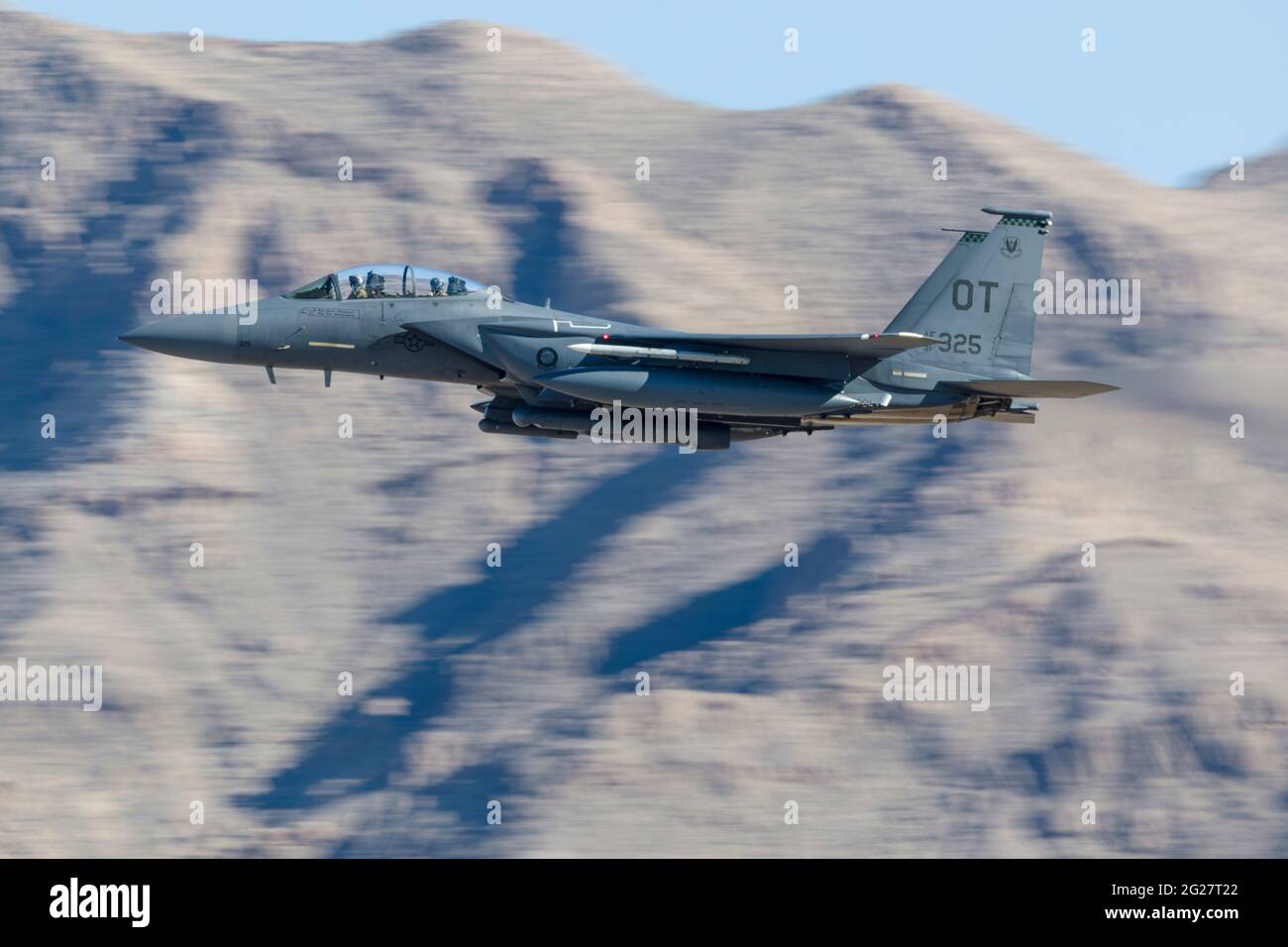 A U.S. Air Force F-15E Strike Eagle makes a low departure Stock Photo ...