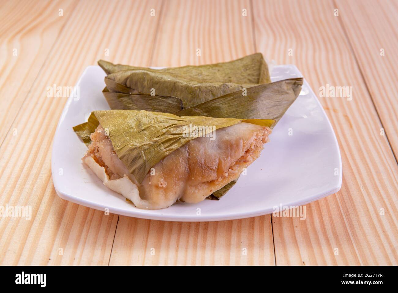 Ela Ada or Steamed sweet rice dumblings,steamed rice cakes wrapped in ...