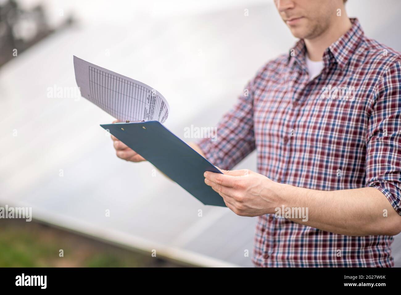 Man engineer checking documents hi-res stock photography and images - Alamy