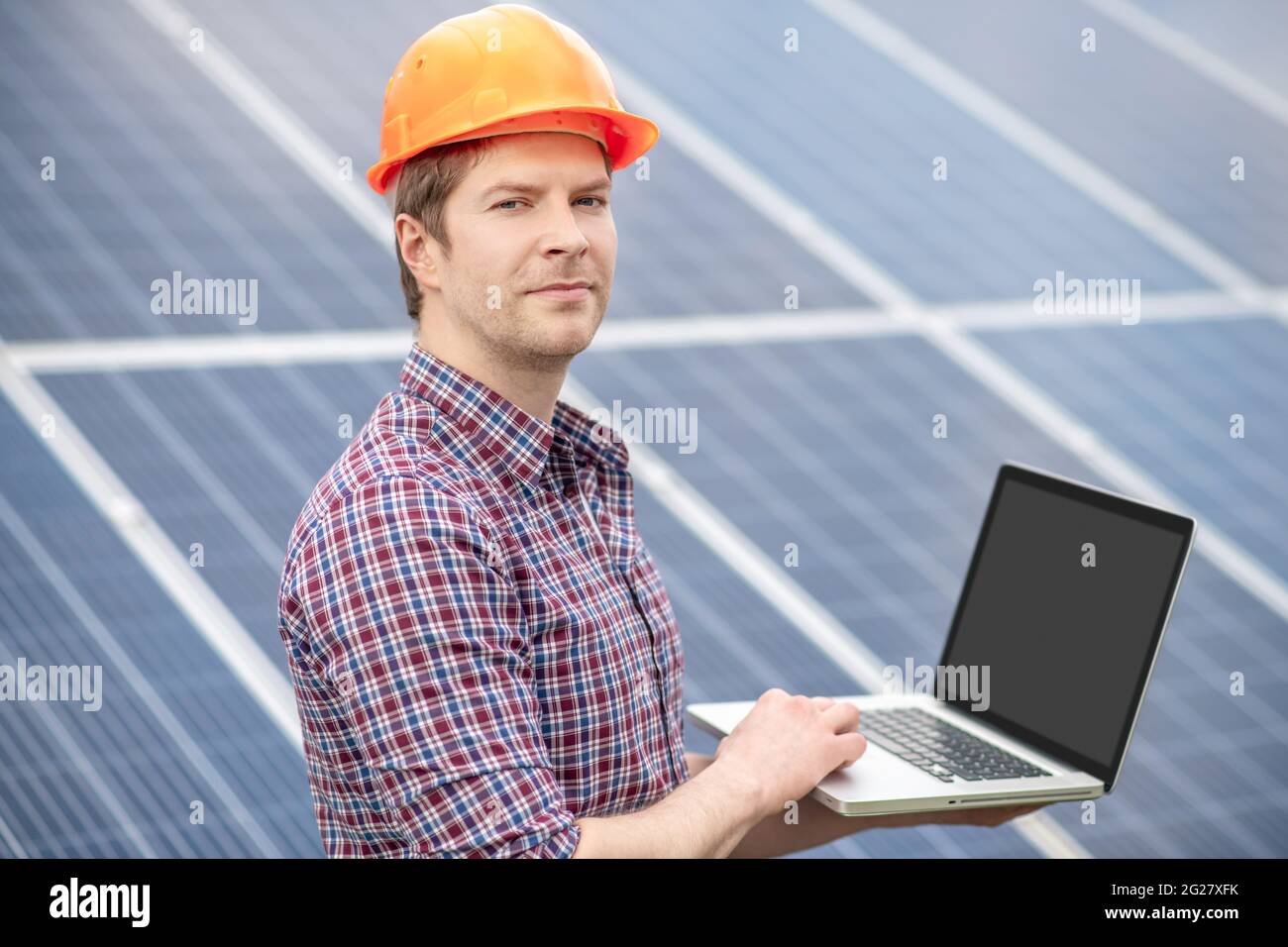 Young man in helmet hi-res stock photography and images - Alamy