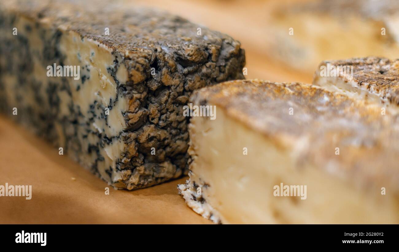 Handmade blue cheese chunks on the counter Stock Photo - Alamy