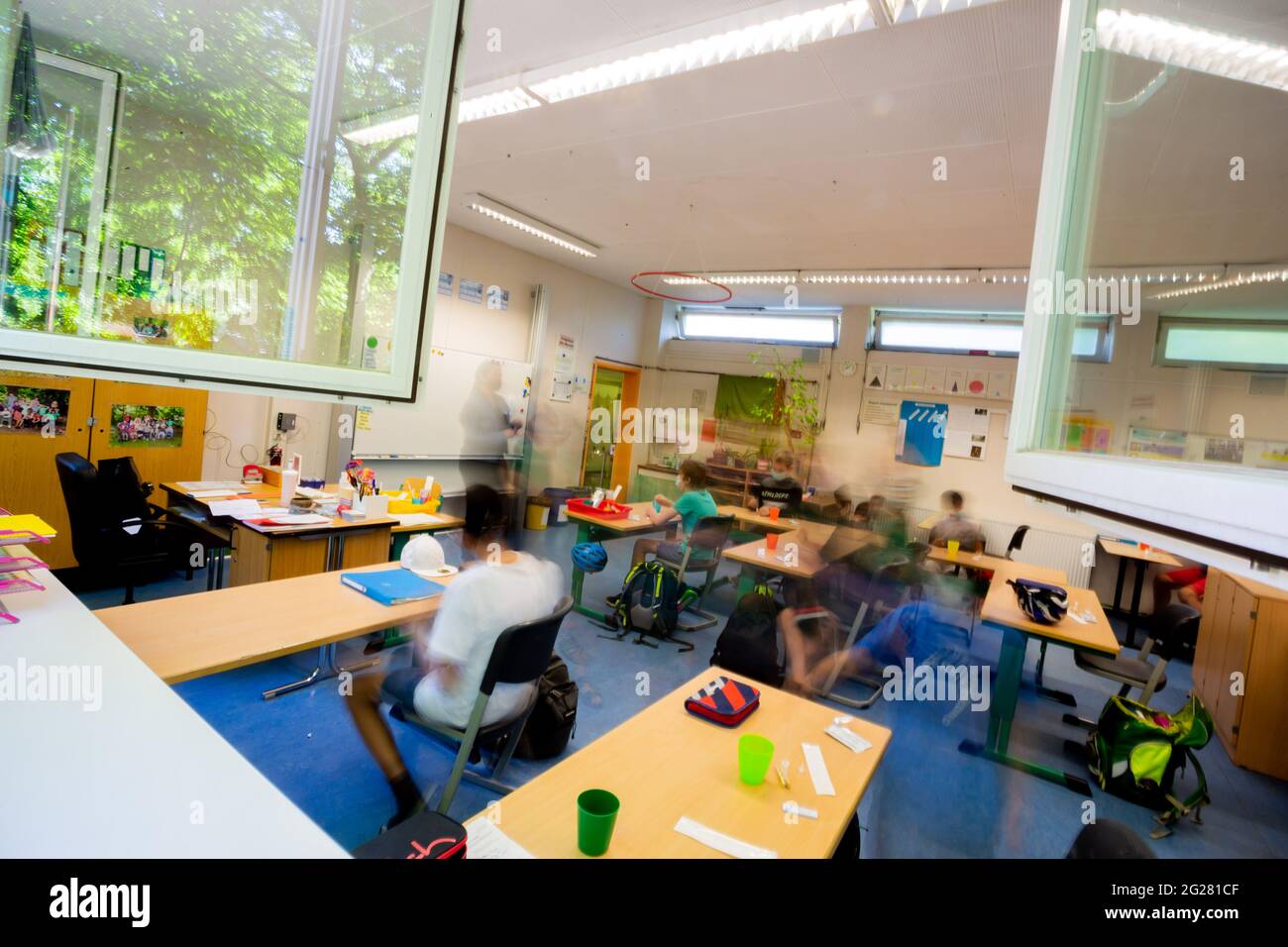 Berlin, Germany. 09th June, 2021. Pupils of a mixed class of grades 4-6 ...