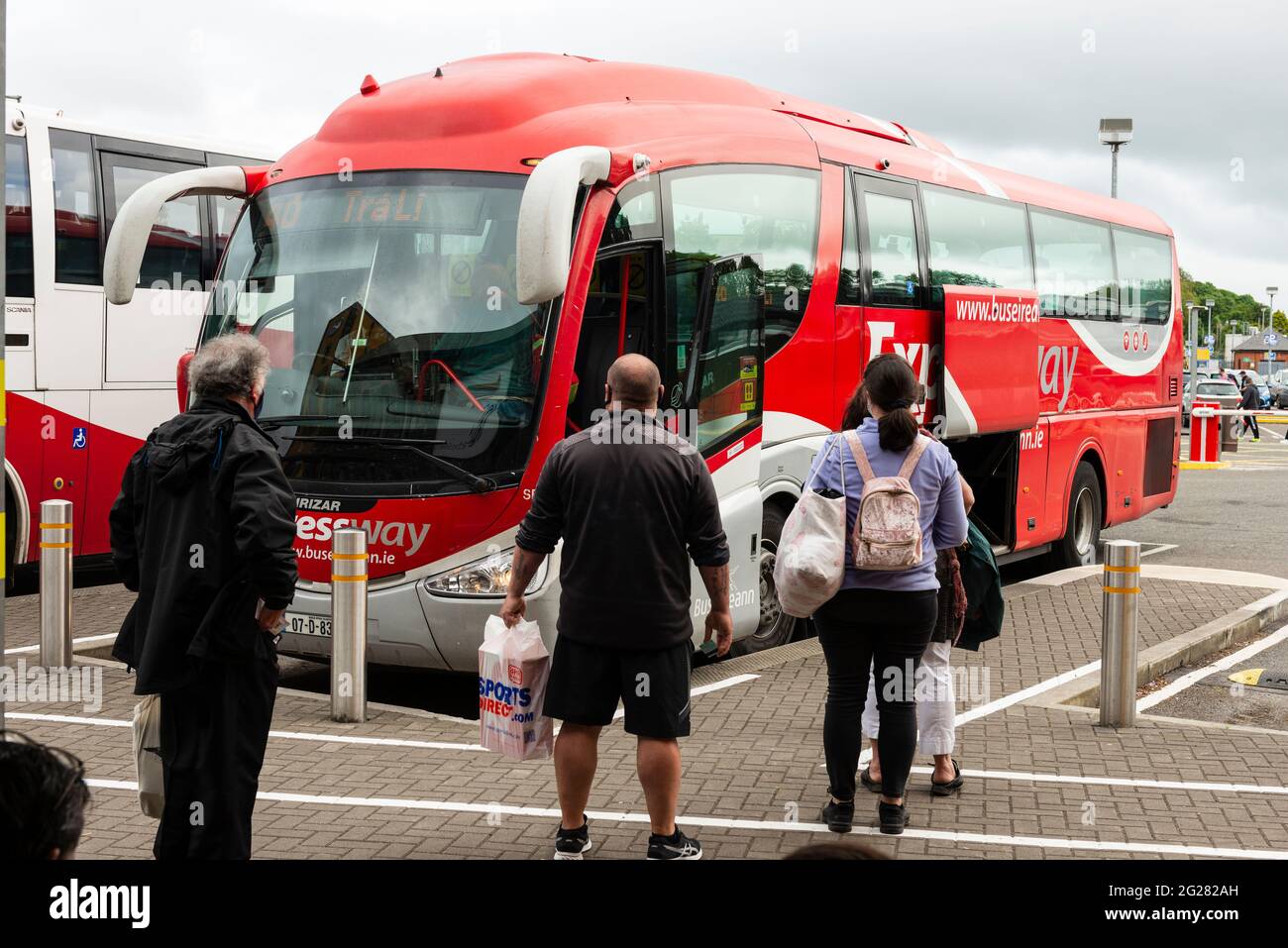 People in line for getting on an Expressway bus by Bus Eireann to ...