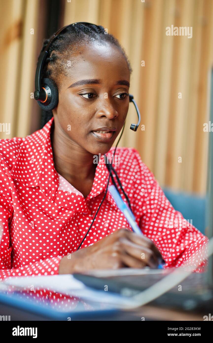 African american woman works in a call center operator and customer ...