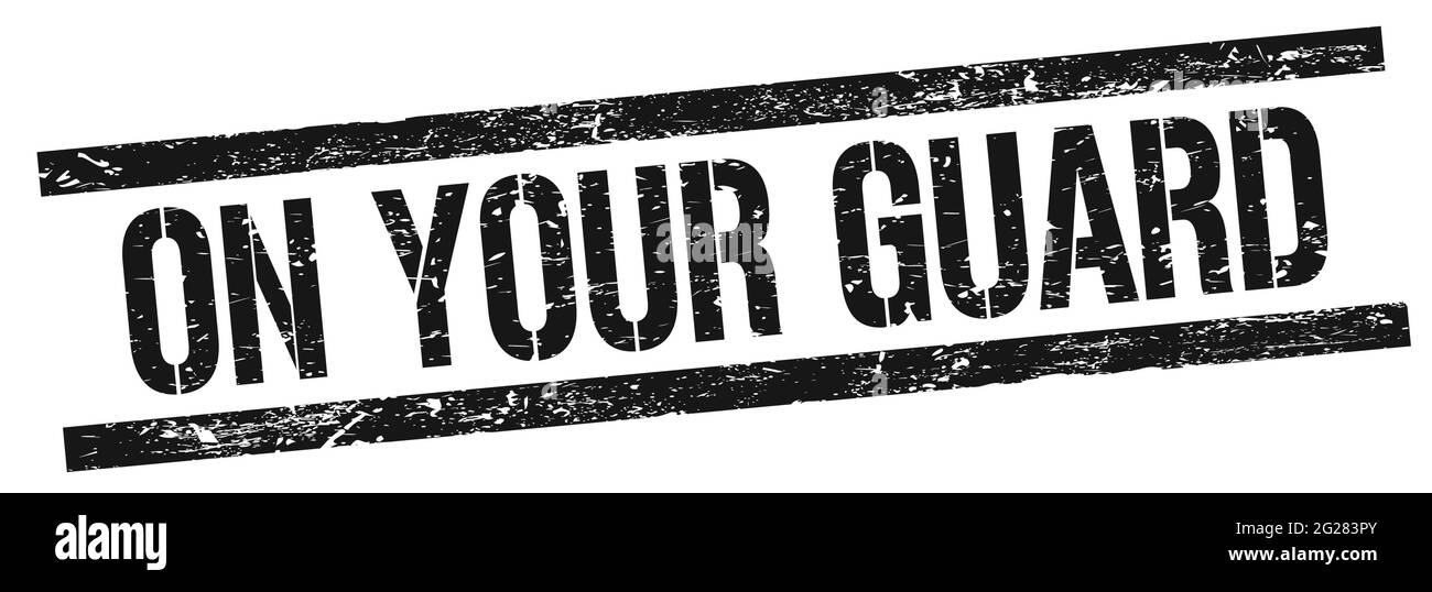 ON YOUR GUARD text on black grungy rectangle stamp sign Stock Photo - Alamy