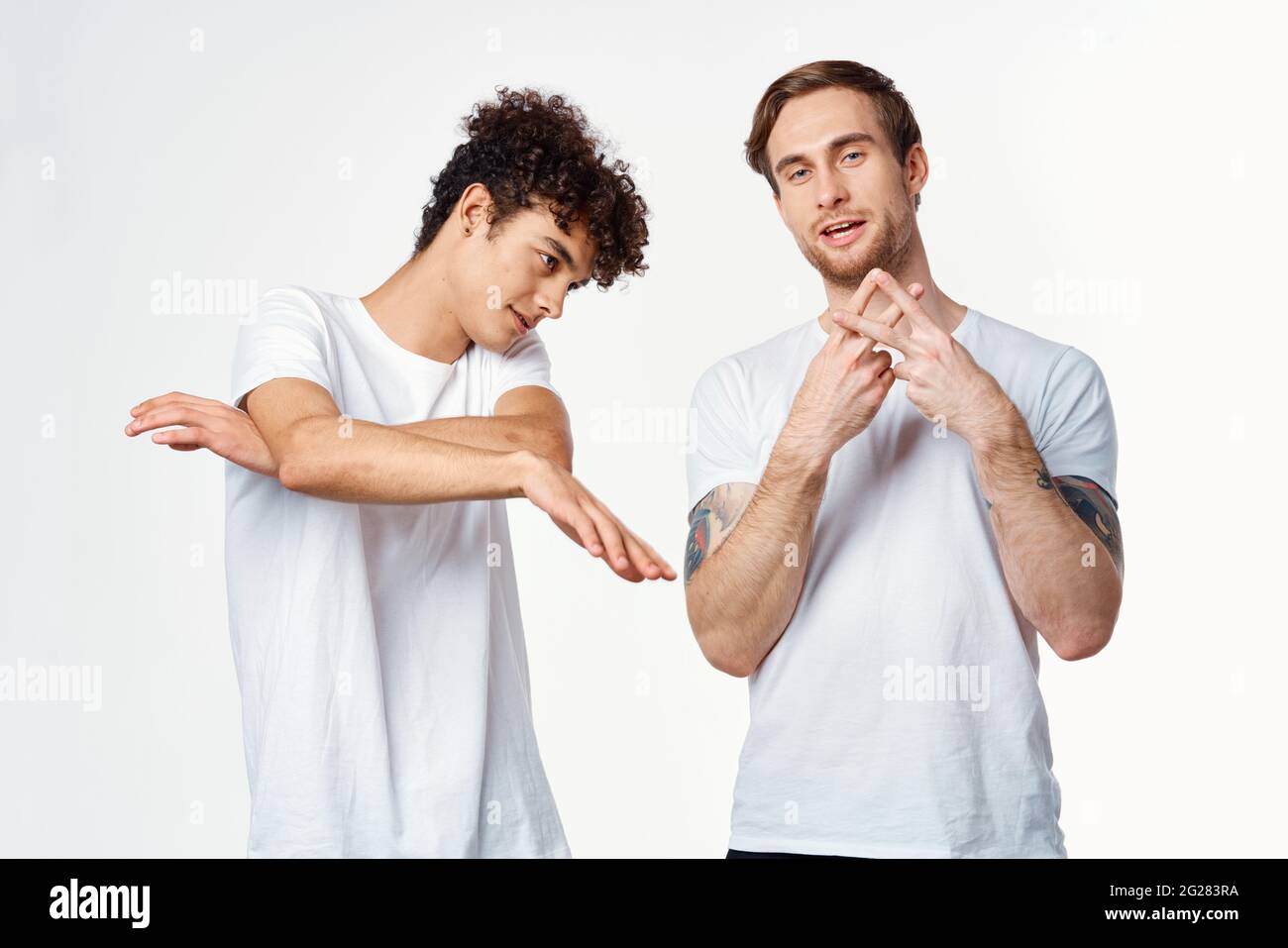 Portrait two brothers standing back hi-res stock photography and images ...