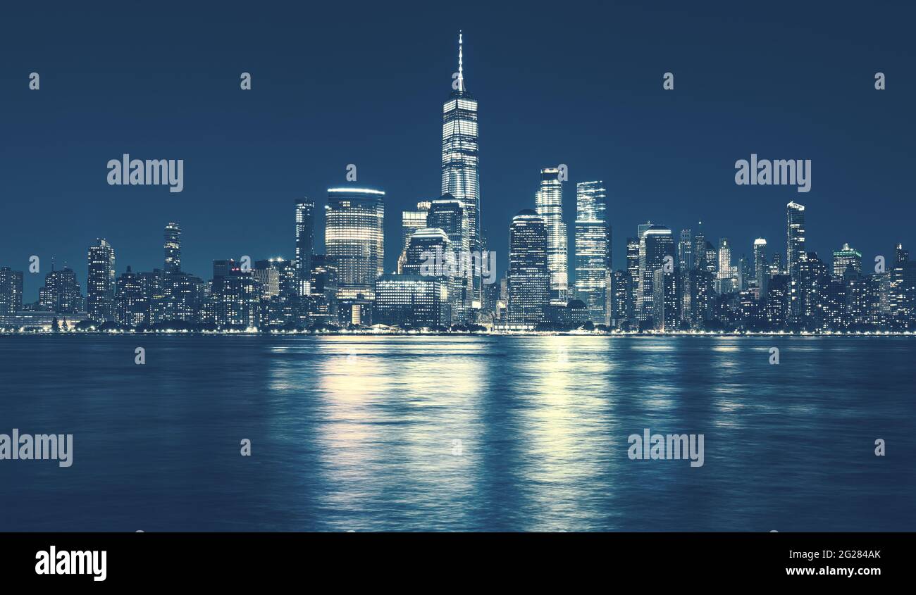 Manhattan skyline at night, blue color toned, New York City, USA Stock ...