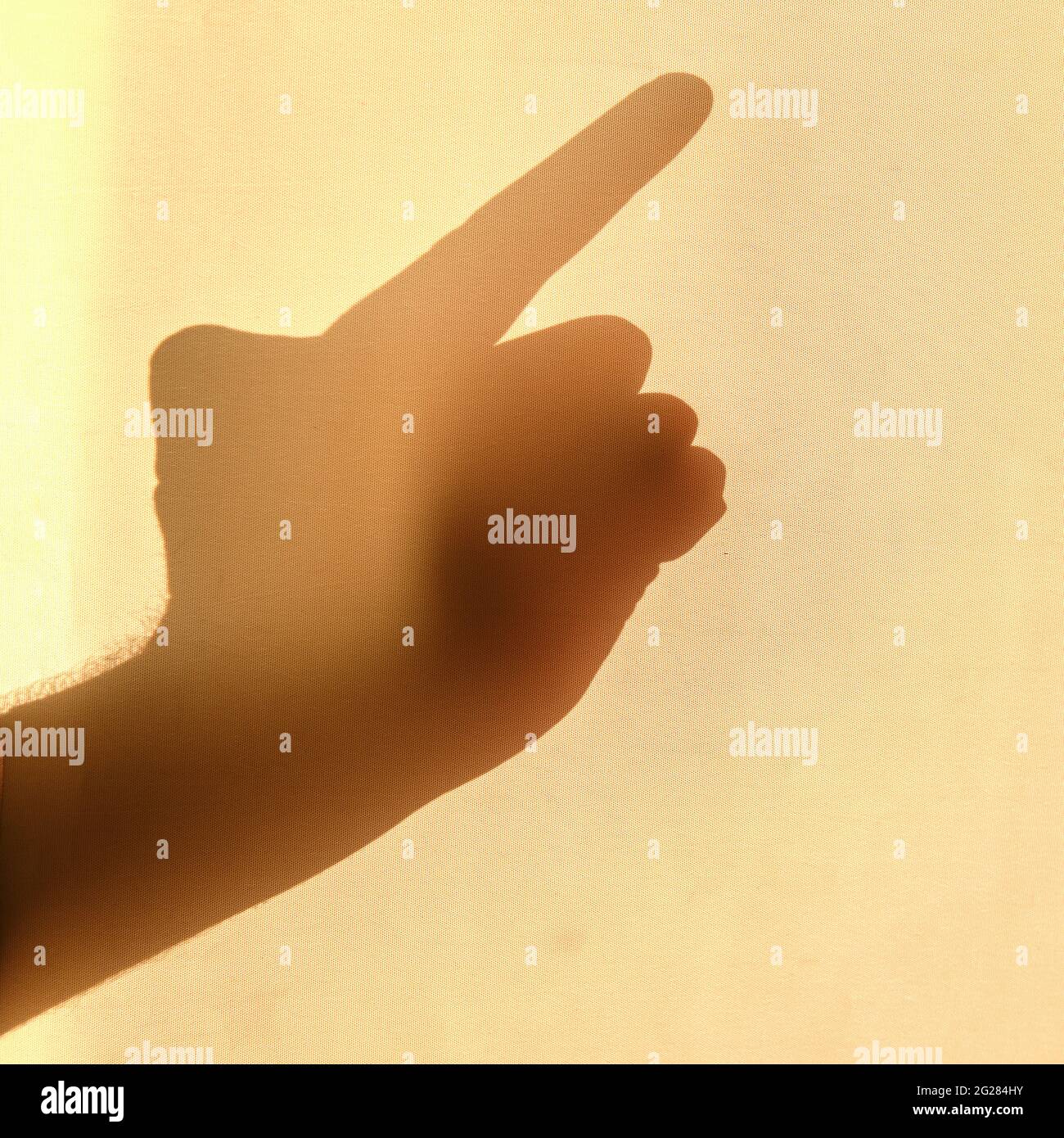 Shadow of a man hand shows gesture with forefinger, silhouette Stock ...