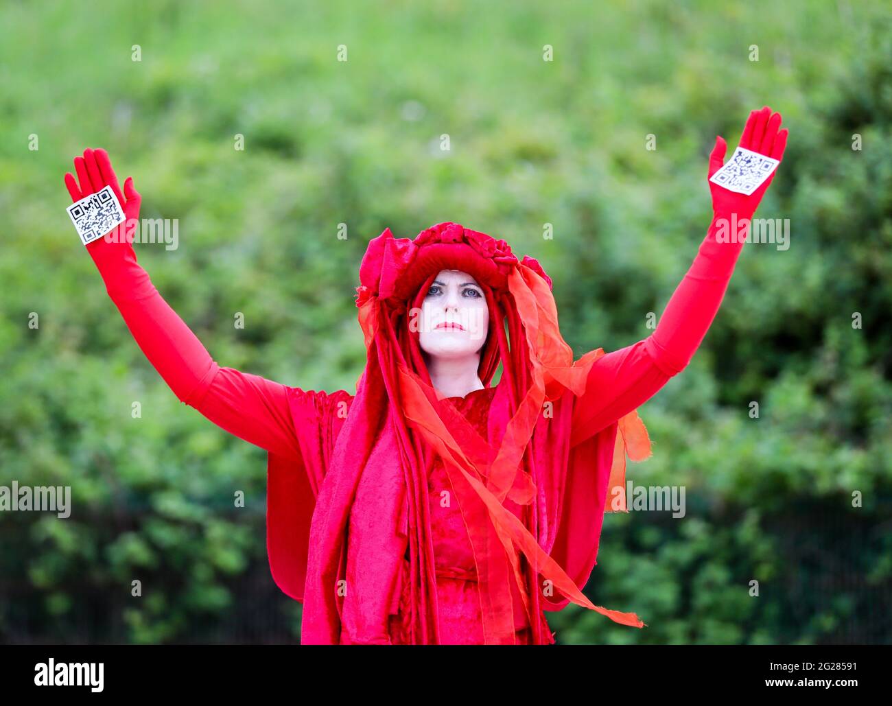 The Red Rebel Brigade hold a 'Tea in the Sea' protest in Belfast Lough ...
