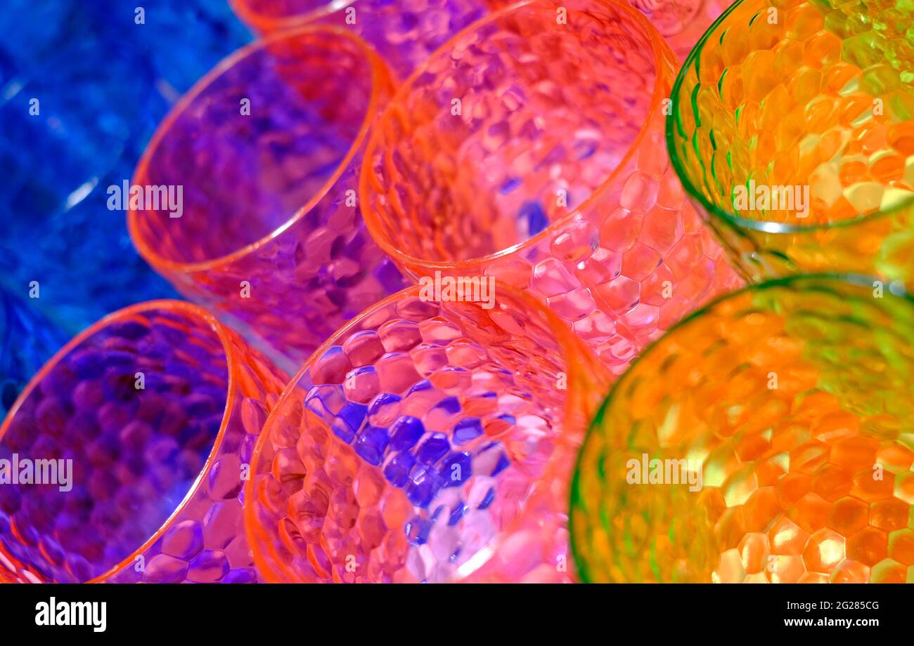 colourful multi-coloured plastic beakers background Stock Photo - Alamy