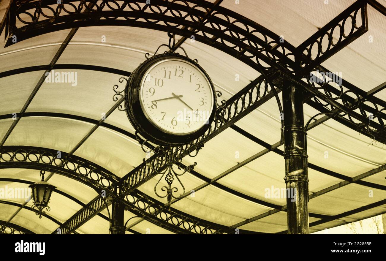 Old railway clock hanging hi-res stock photography and images - Alamy