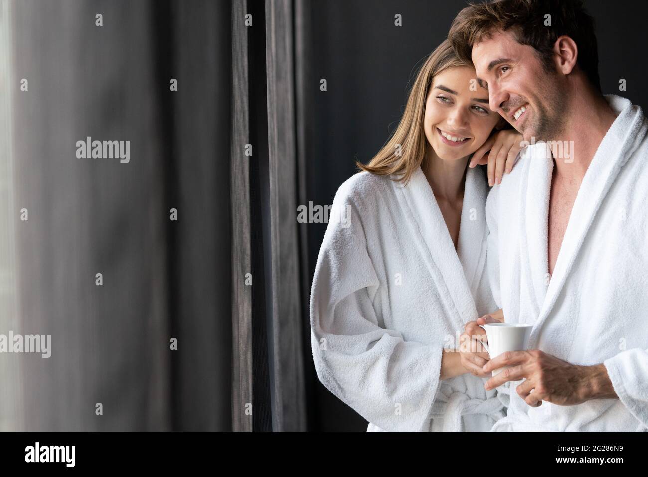 Happy married couple relaxing at wellness spa resort Stock Photo - Alamy