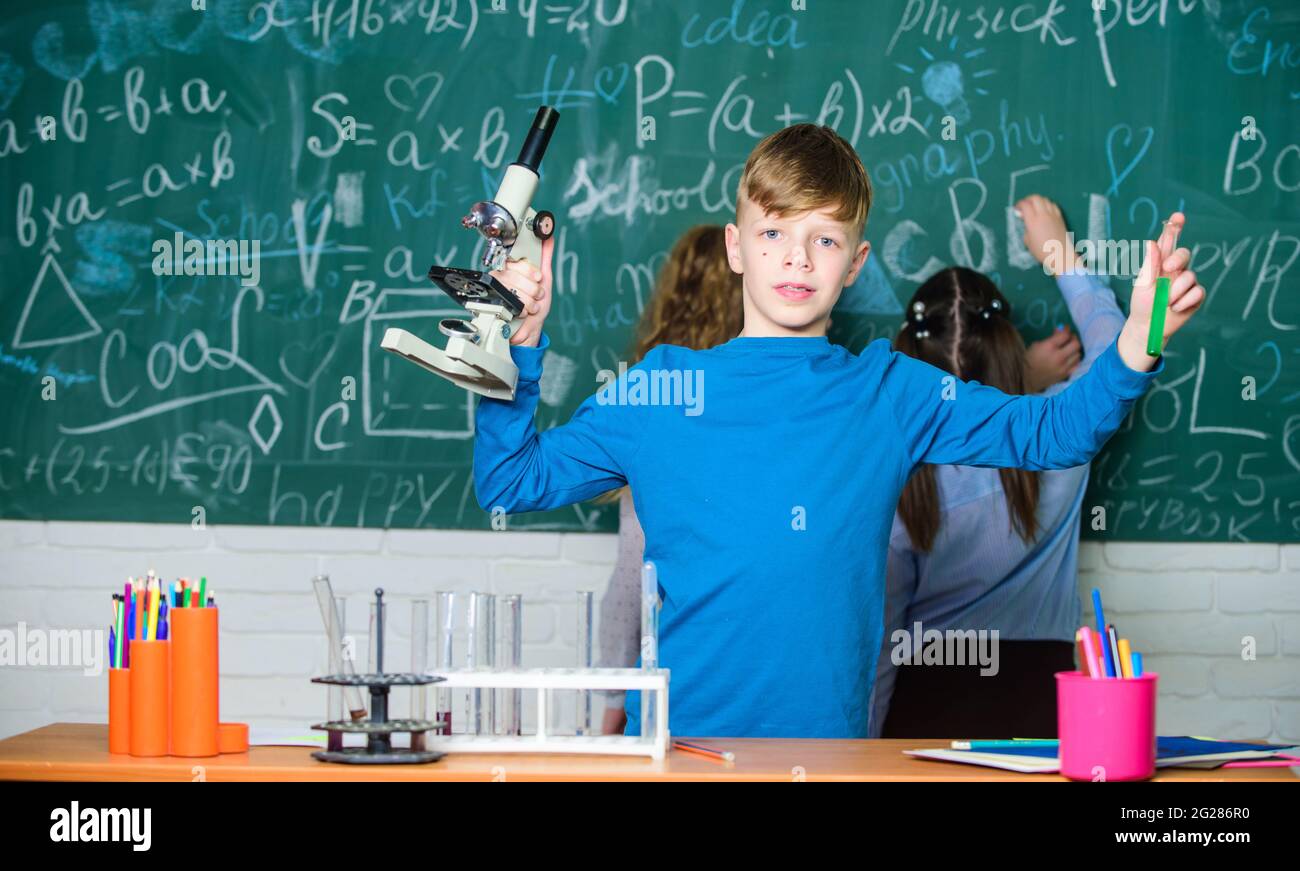 Little boy in lab. Chemistry science. biology experiments with ...