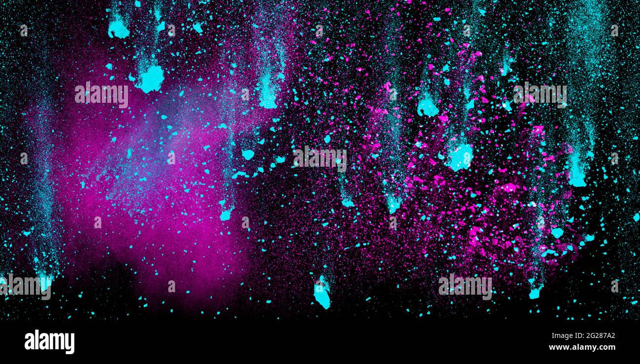 Bright colorful powder explosion. Pink blue abstract dust of paint on ...