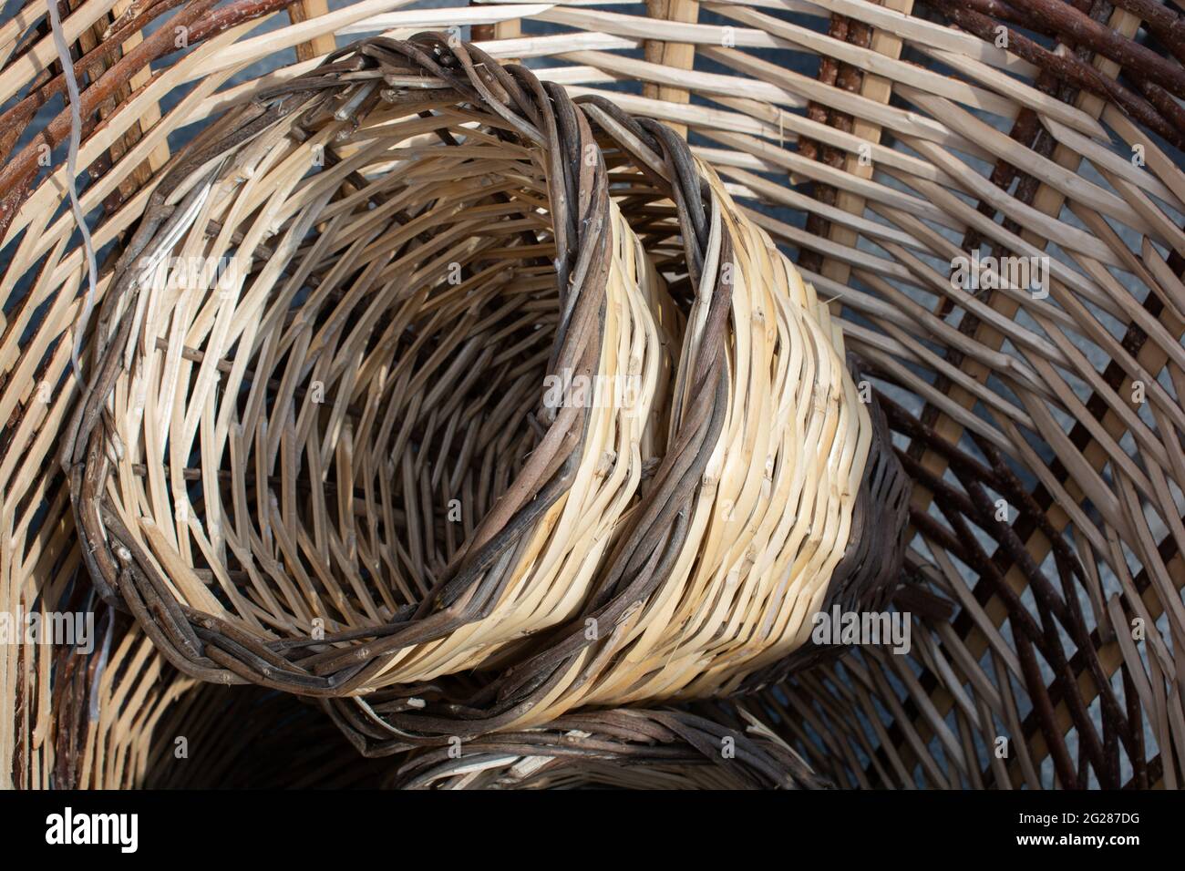 Closeup shot of straw baskets inside each other Stock Photo - Alamy
