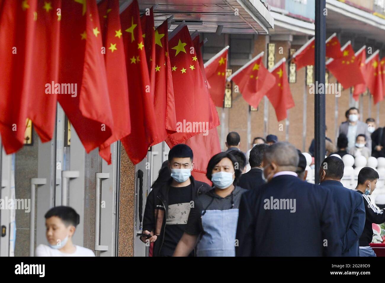 The Chinese national flags fly around the International Grand Bazaar in ...