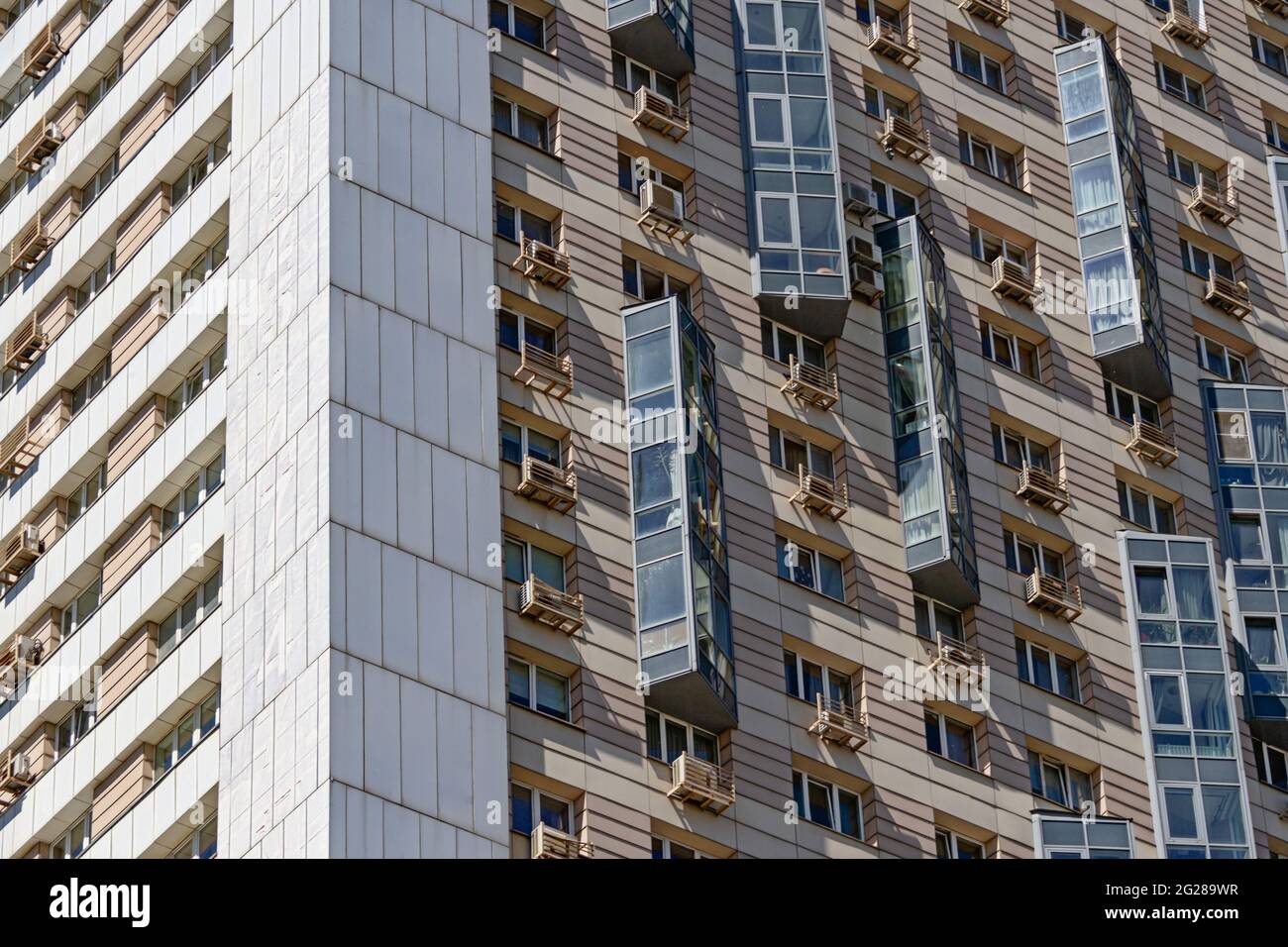 Detail of a modern high-rise apartment building. Typical city ...