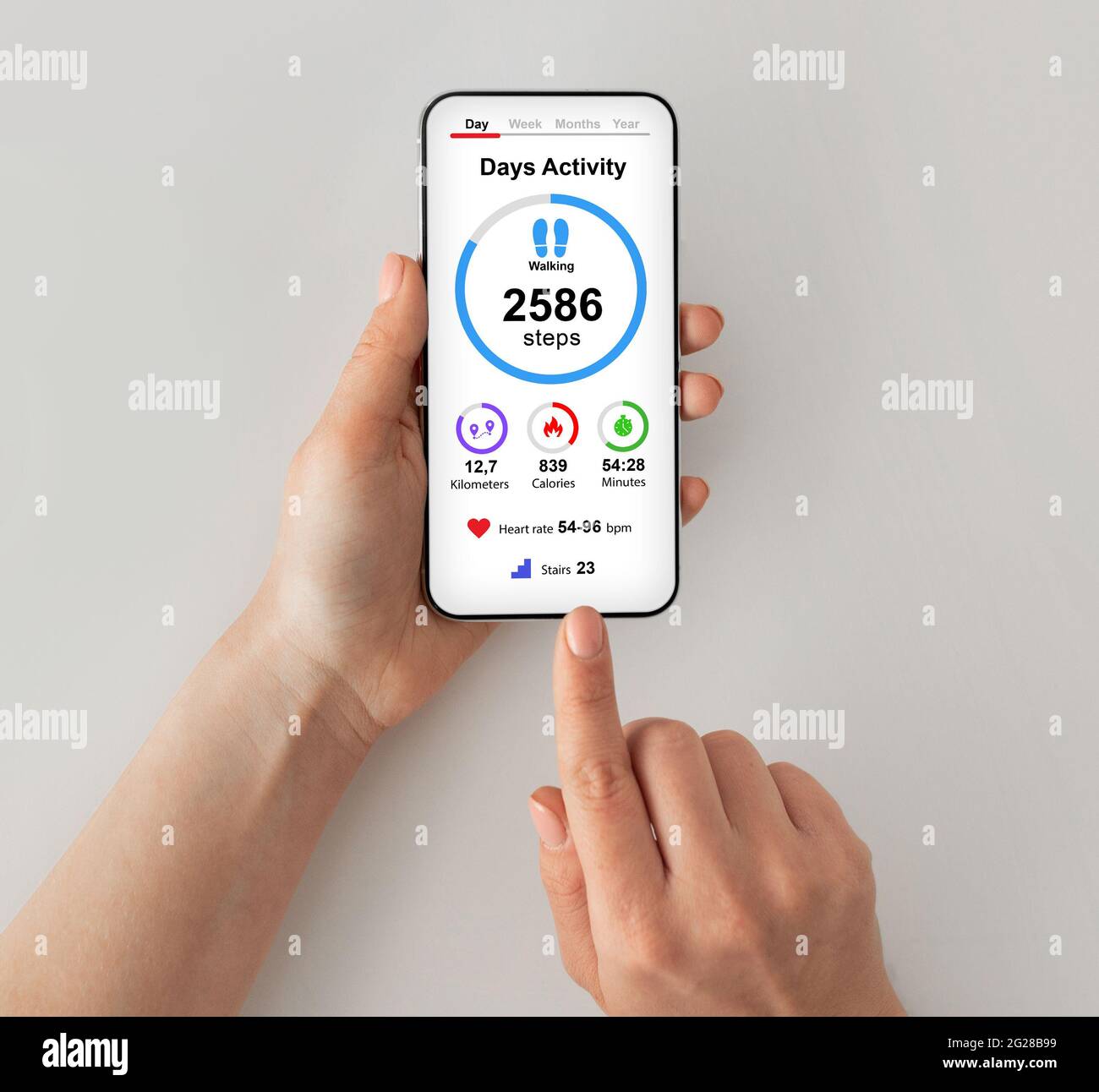 Health app on smartphone screen in female hands Stock Photo - Alamy