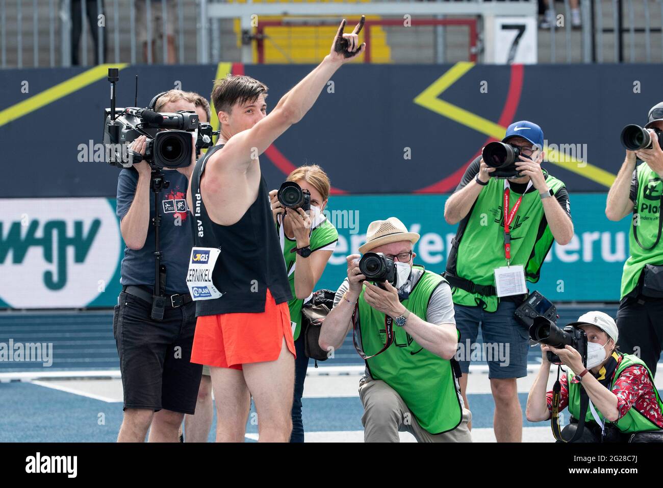 Winner Oleg ZERNIKEL (ASV Landau) celebrates after his victory jump ...