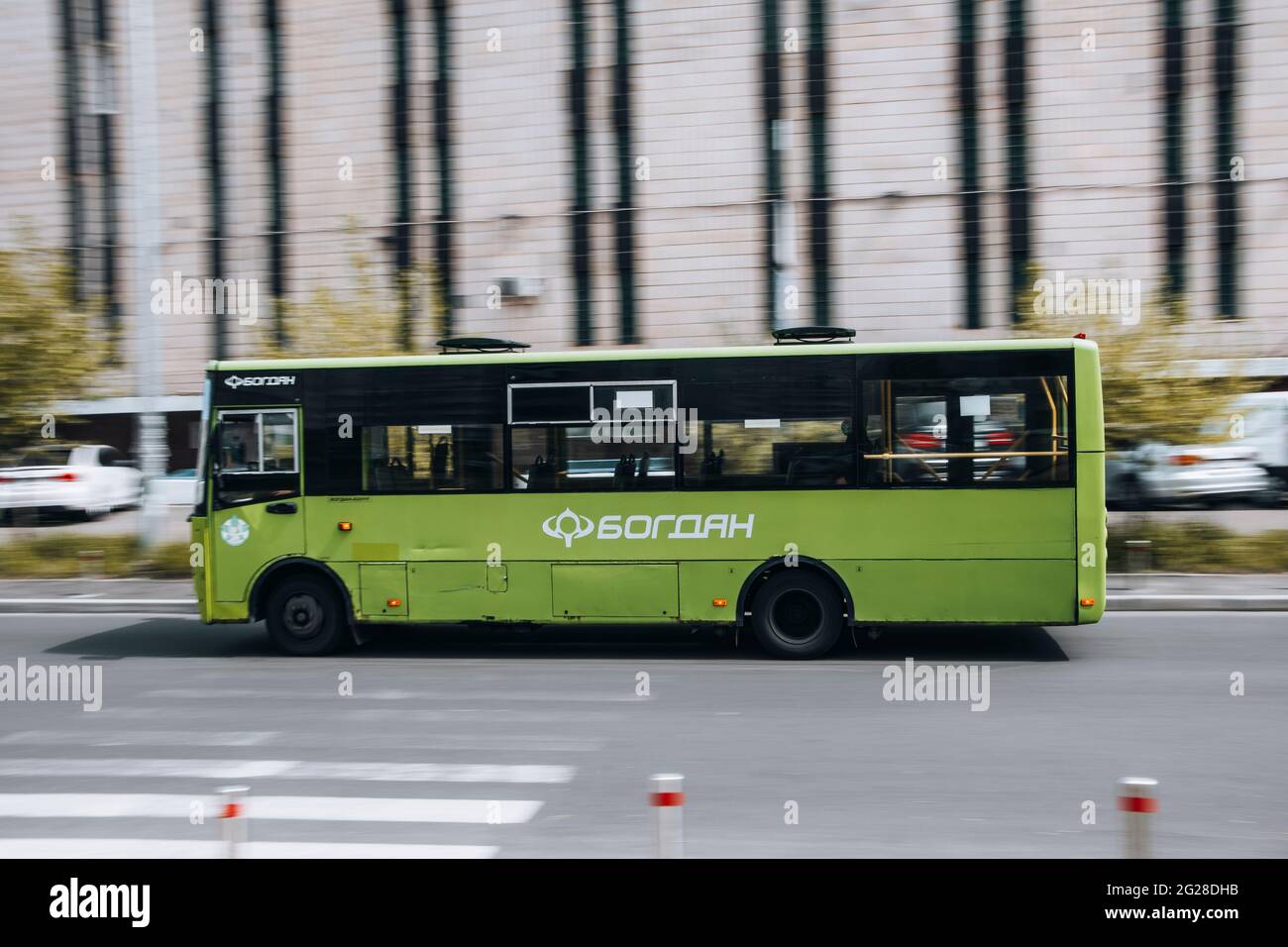 Ukraine, Kyiv - 13 May 2021: Green Bogdan public bus moving on the ...