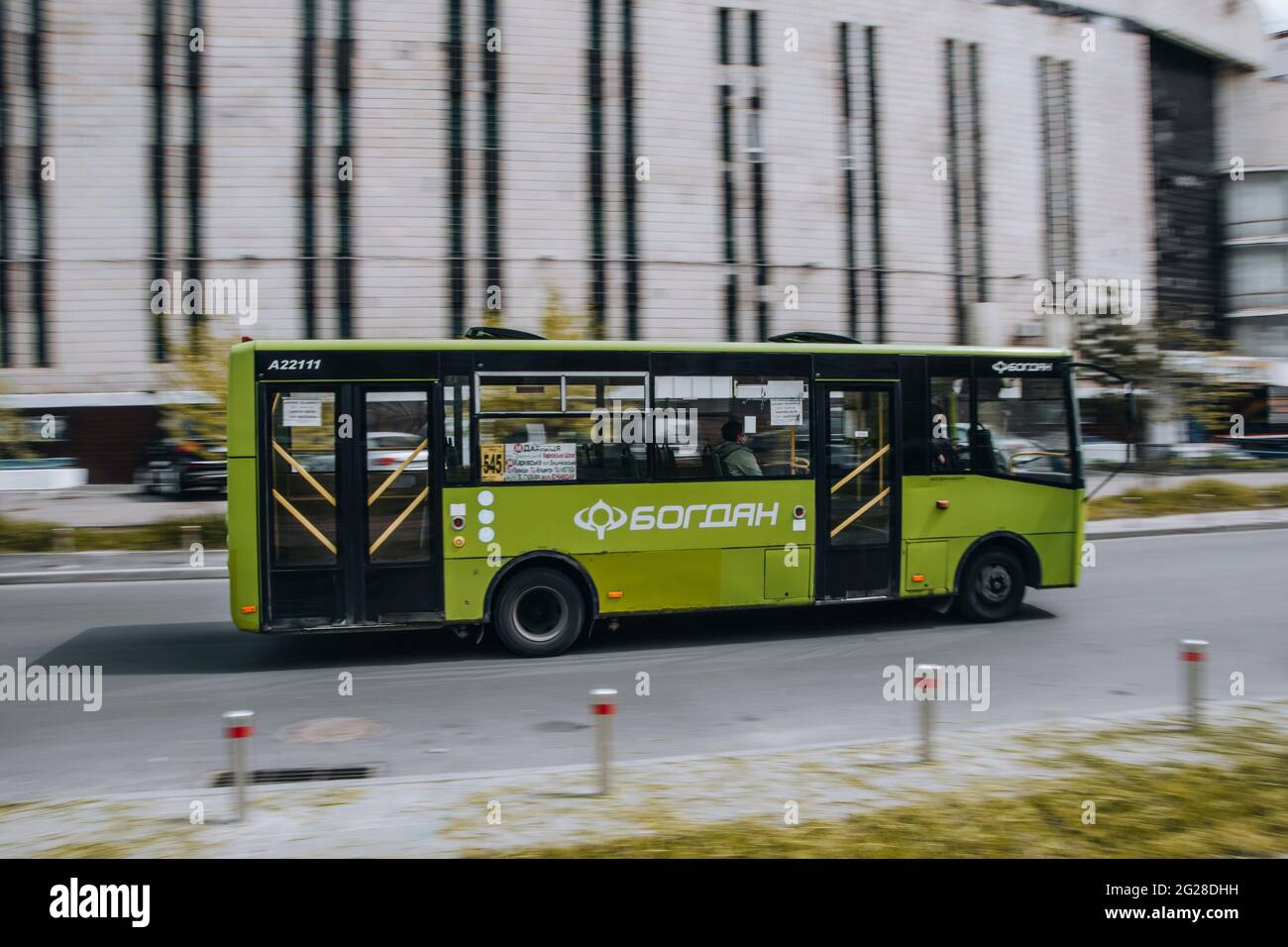 Ukraine, Kyiv - 13 May 2021: Green Bogdan public bus moving on the ...
