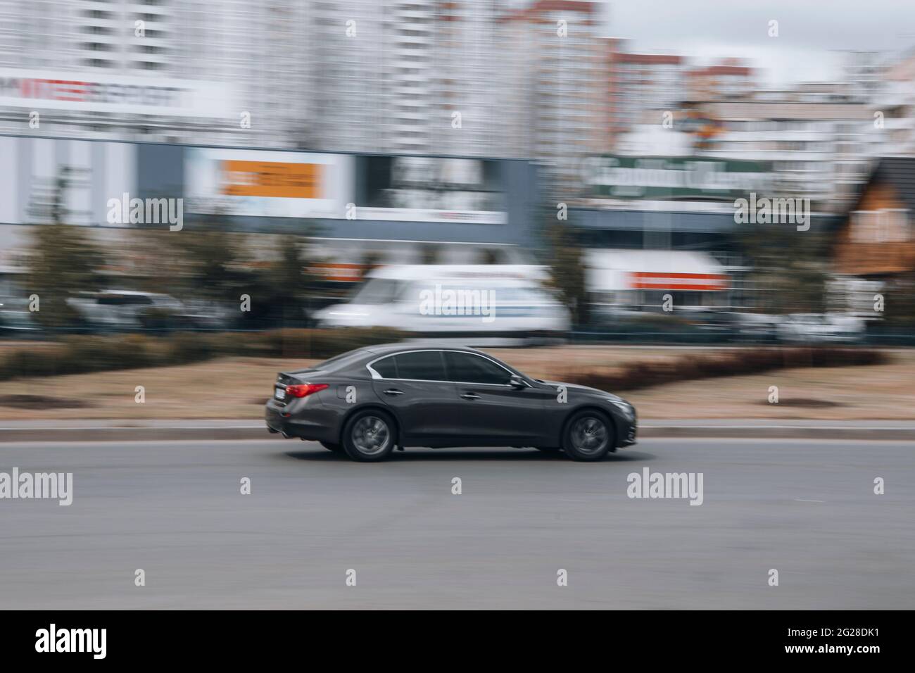 Ukraine, Kyiv - 13 May 2021: Gray Infiniti Q50 car moving on the street ...