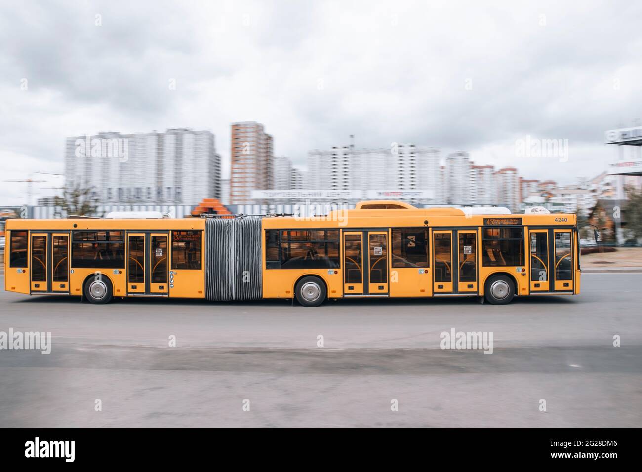 Ukraine, Kyiv - 13 May 2021: Yellow MAZ municipal bus moving on the ...
