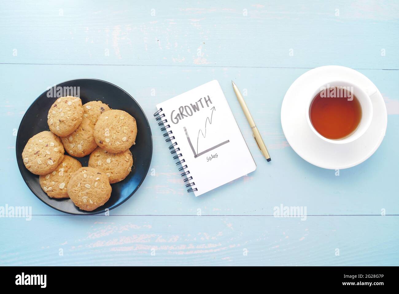 hand written growth chart on notepad at office desk Stock Photo - Alamy