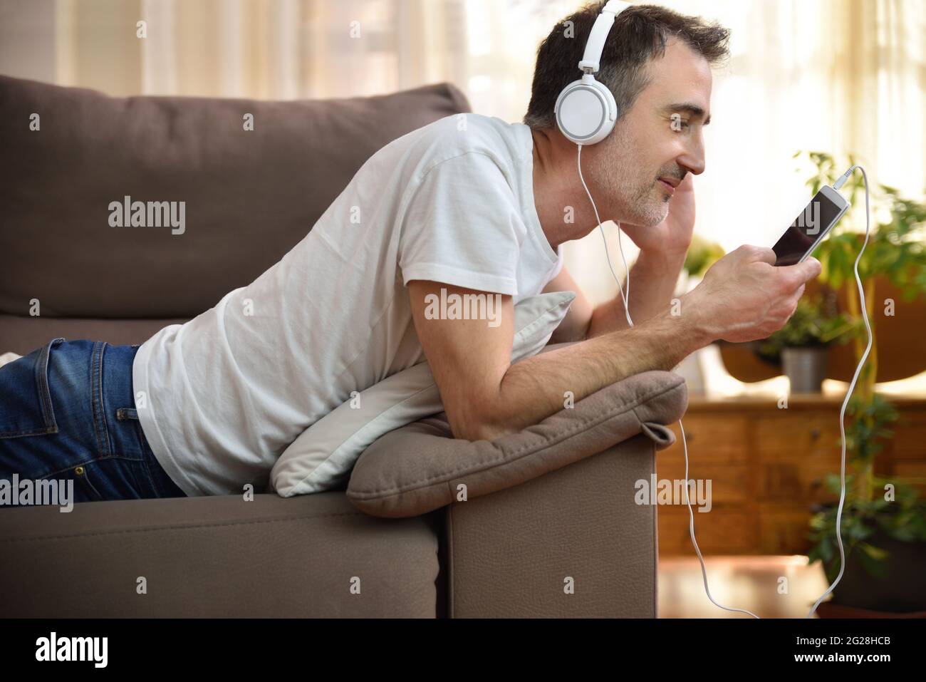 Relaxed man home hi-res stock photography and images - Alamy