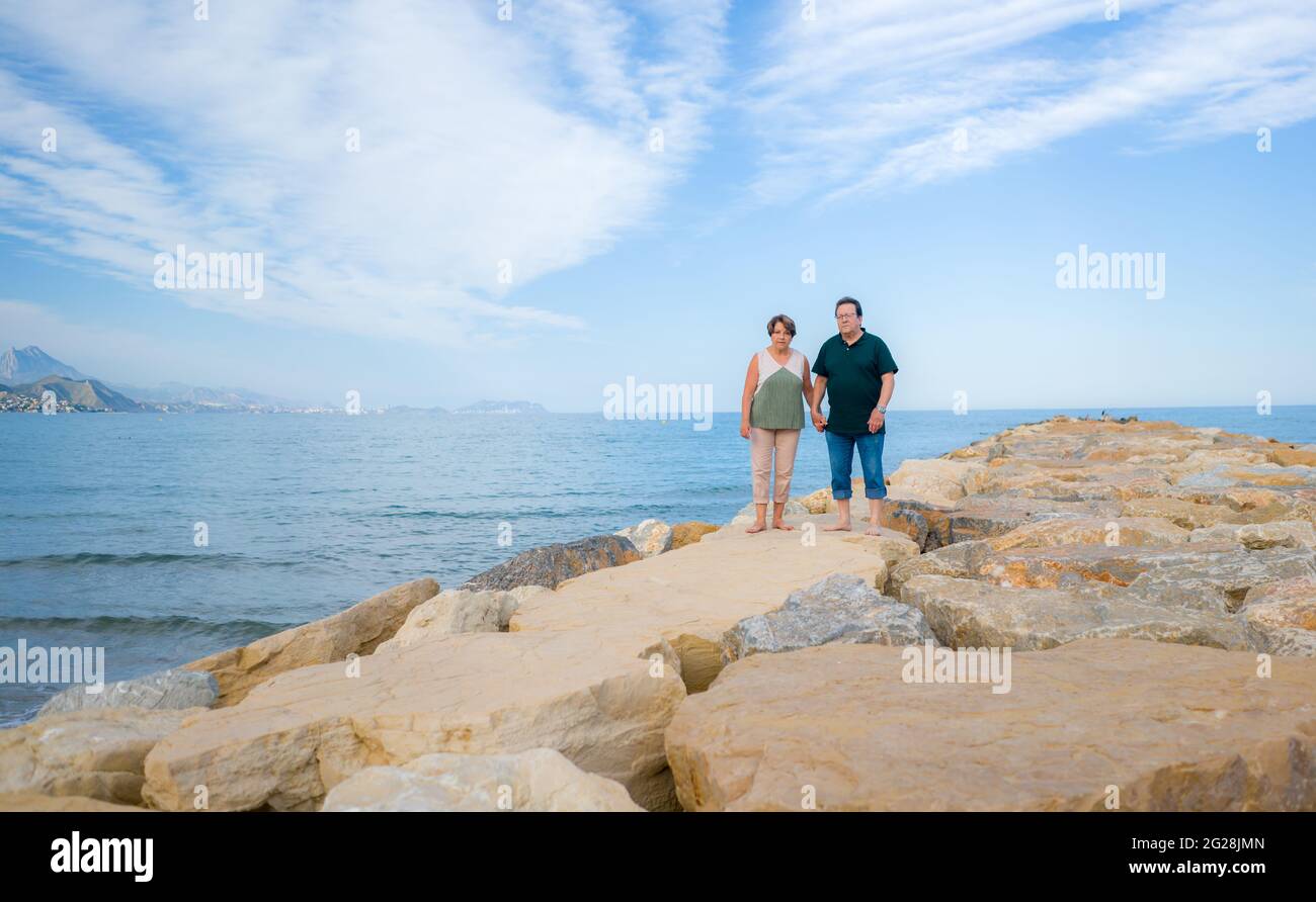 lifestyle portrait of loving happy and sweet mature couple - senior ...