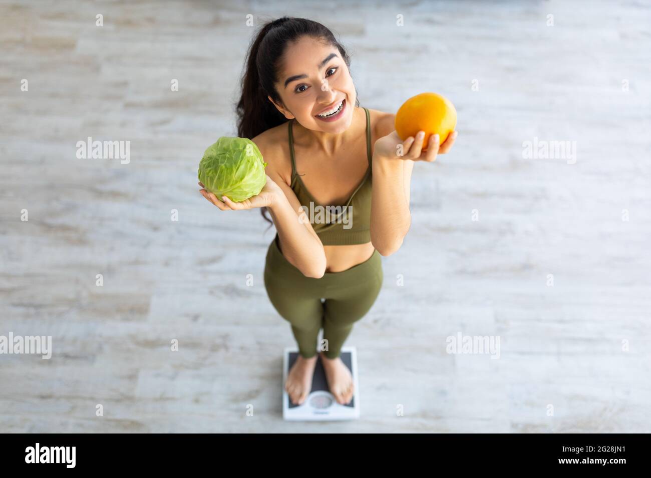 Healthy diet for weight loss. Above view of millennial Indian lady ...