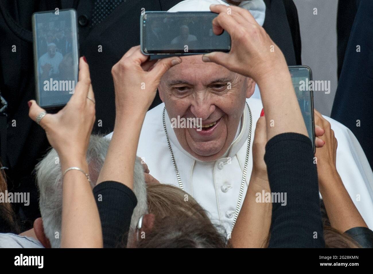 June 9, 2021 : Pope Francis is photographed by the faithfull as he ...