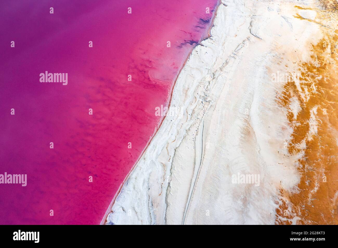Abstract view of pink lake salt water from drone. Creative nature color ...