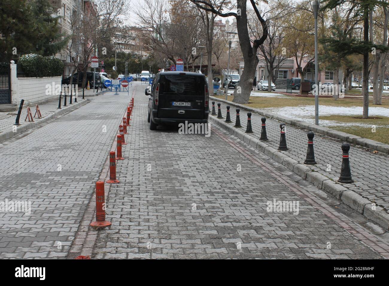 cross-street road and parked cars Stock Photo - Alamy