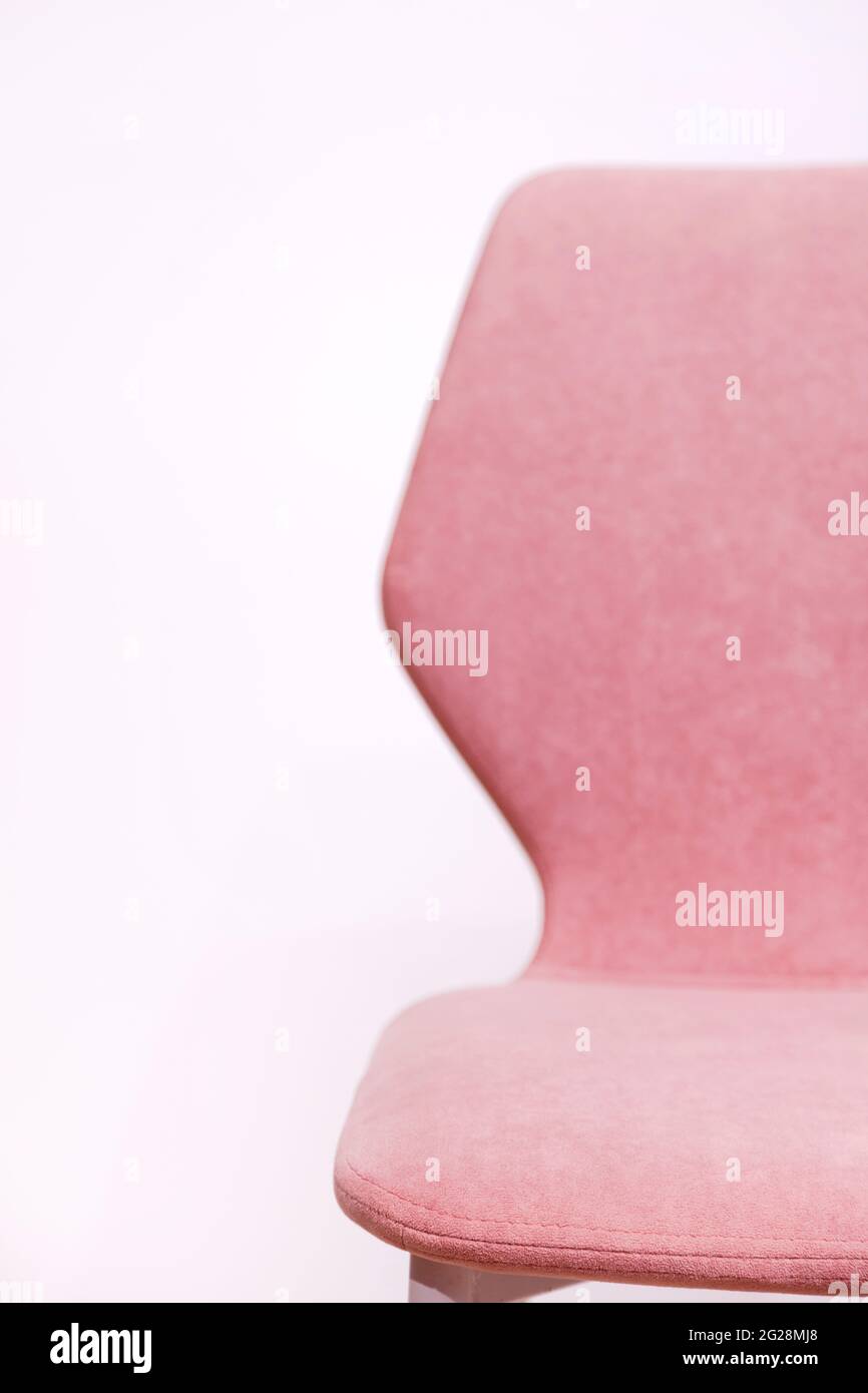 Pink color armchair. Modern designer chair on white background. View on ...