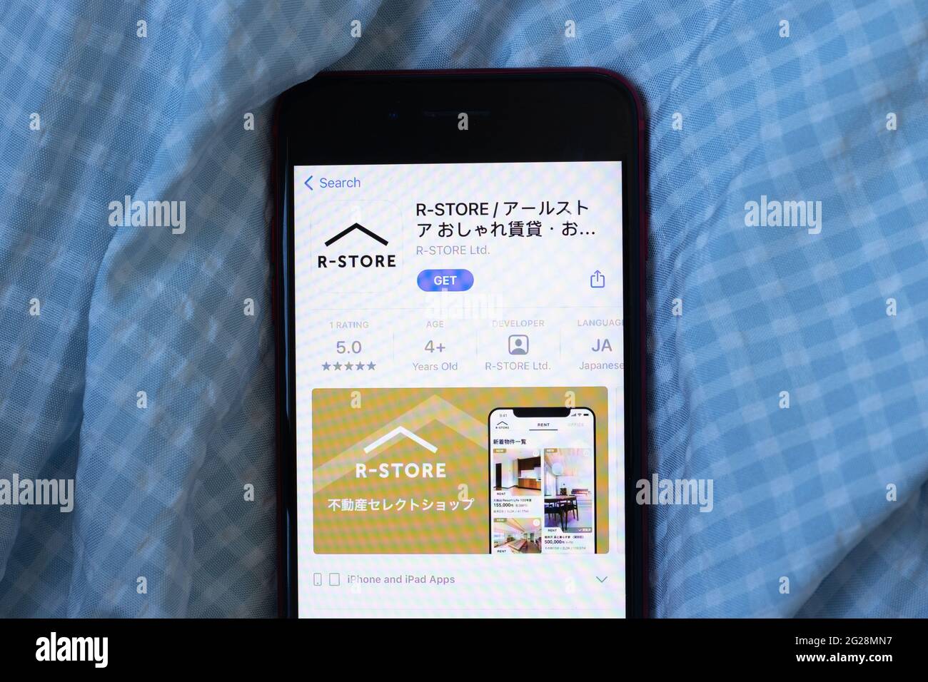 New York, USA - 1 June 2021: R-STORE mobile app logo on phone screen ...