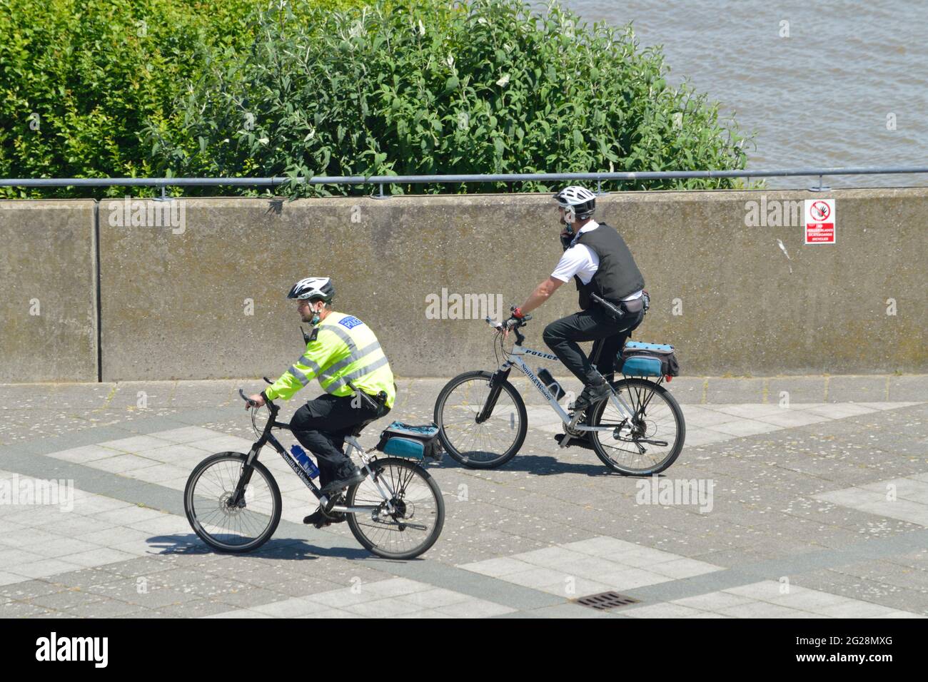 Two Police Officers from Newham MPS on a bike patrol visiting Gallions ...