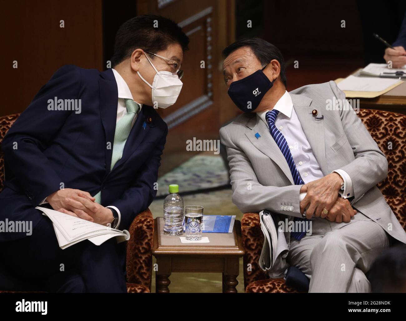 Tokyo, Japan. 9th June, 2021. Japanese Finance Minister Taro Aso (R ...