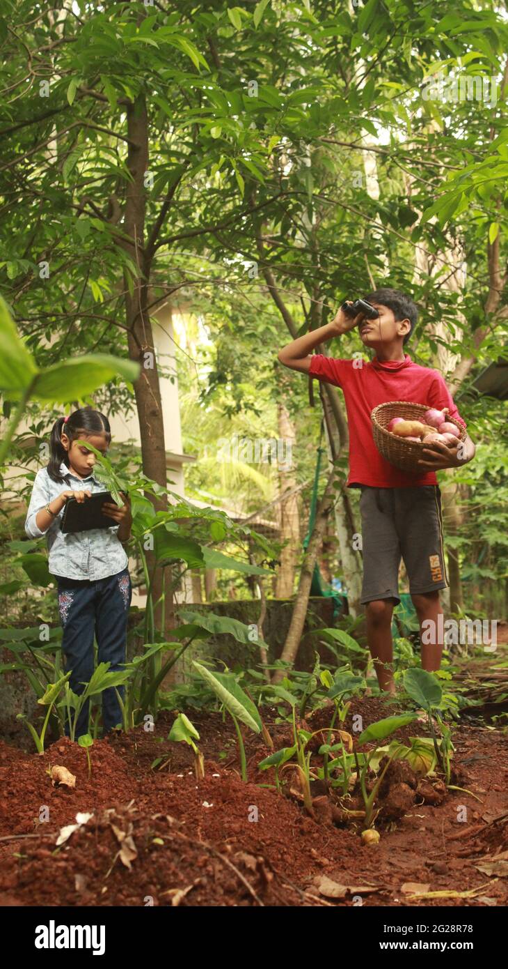 Two Children Working in Farm using Agriculture Technology Surrounded by ...