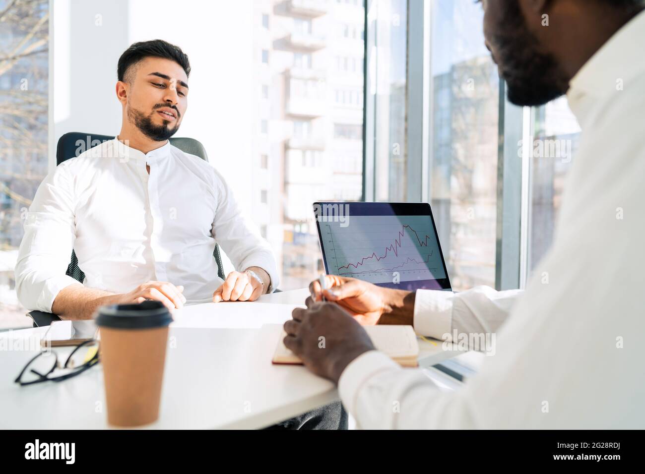 Company manager interviews new employee Stock Photo - Alamy