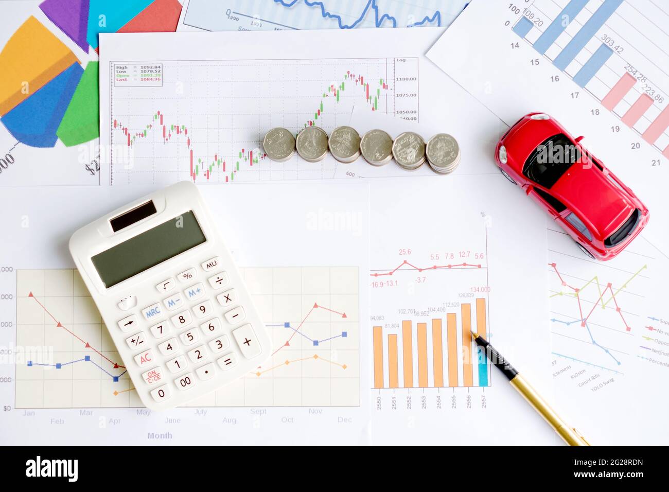 Car expenses calculate with notes and toy car Stock Photo - Alamy